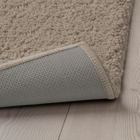 Covor lung bej IKEA VOGE: adauga confort si stil spatiului tau.